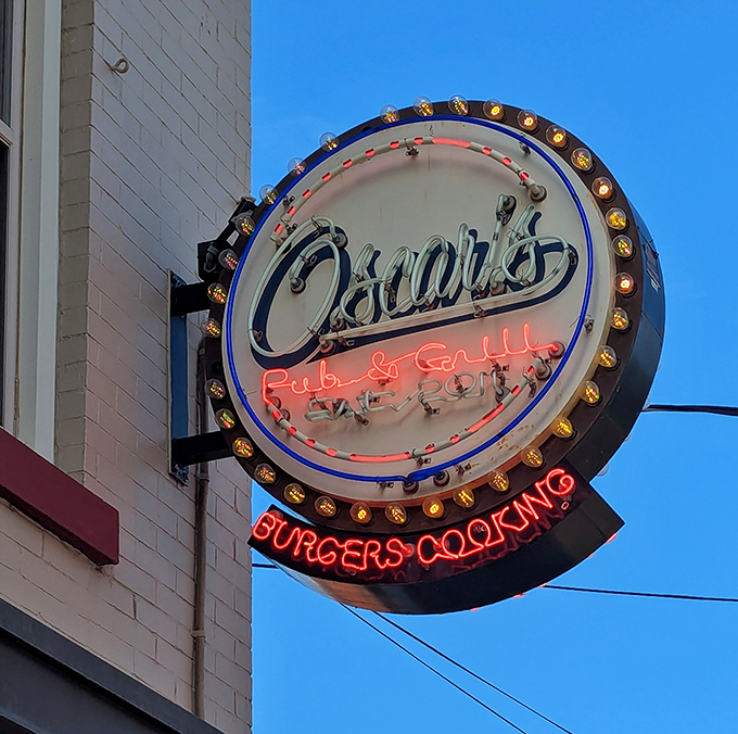 That neon sign doesn't just mark a location &ndash; it's a beacon of burger hope, guiding hungry pilgrims to their delicious destination.
