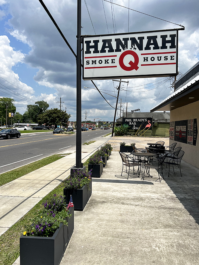 A sign that promises much and delivers more. Those outdoor tables aren't just seating&mdash;they're front-row tickets to the best show in town.