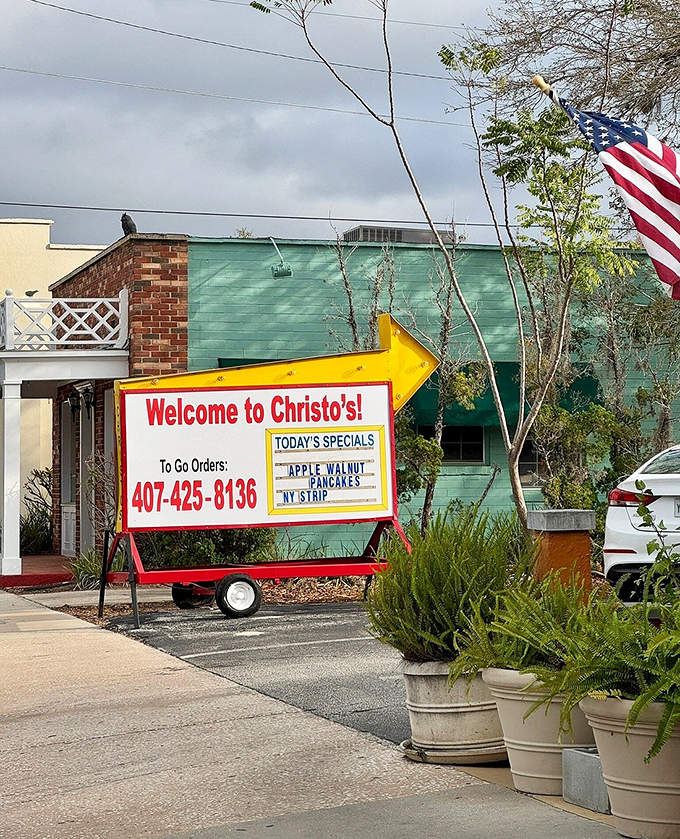 The cheerful welcome sign with daily specials is like a handwritten invitation to the best breakfast party in town.