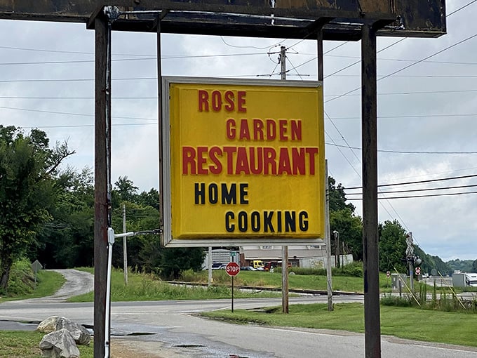 That yellow roadside sign has guided hungry travelers for years, a beacon of hope promising "HOME COOKING" when you need it most.