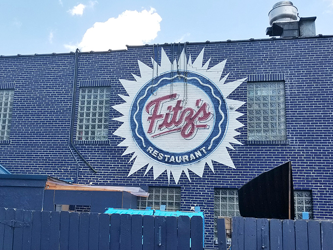 Like a blue brick beacon, the Fitz's logo announces itself to the neighborhood, promising good times and better food to all who approach.