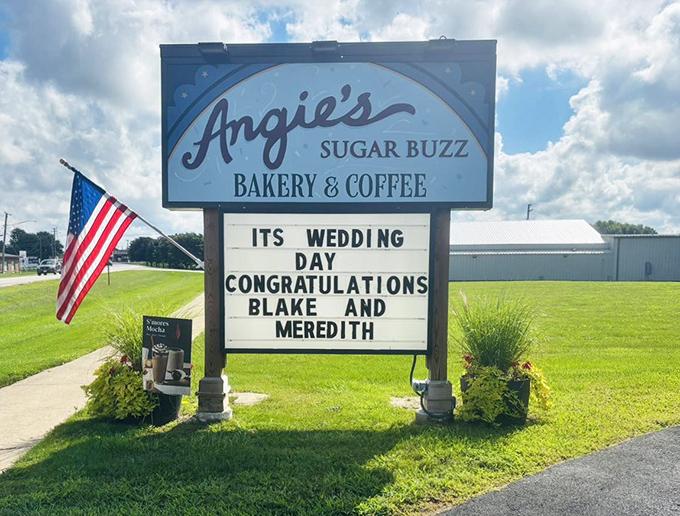 The roadside sign doesn't just announce a bakery&mdash;it celebrates love with personalized congratulations, proving small towns still do it best.
