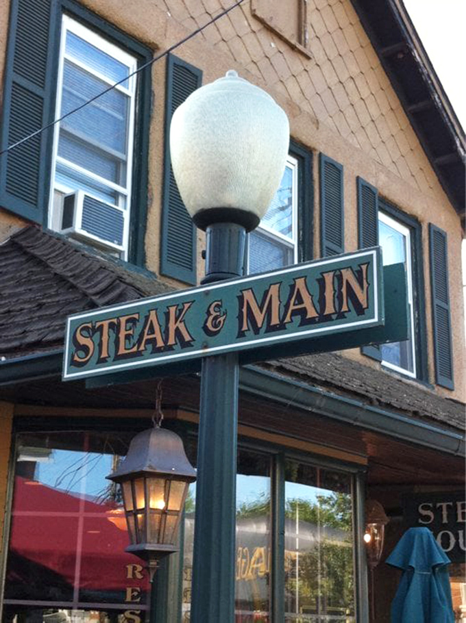 The iconic Steak & Main sign&mdash;where countless food pilgrimages begin and diet resolutions go to die.