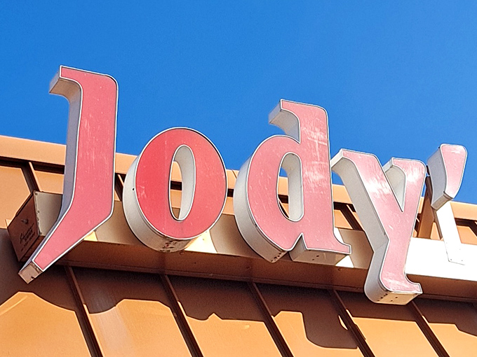 Those red letters against the blue sky spell out more than just a name&mdash;they're a promise of hot dog happiness waiting inside.