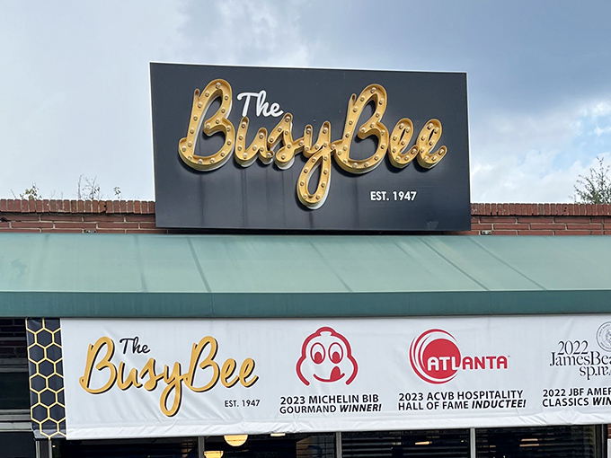 The sign that beckons food lovers from across Georgia. Those awards aren't just decorations&mdash;they're well-earned badges of culinary honor.