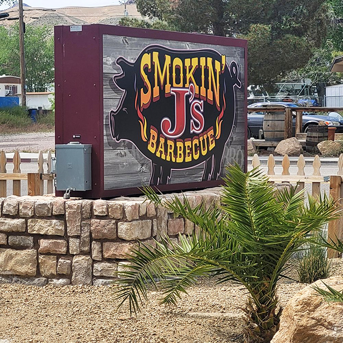 A sign that serves as both landmark and promise. That pig silhouette isn't just decoration&mdash;it's a beacon calling to hungry travelers across the desert.
