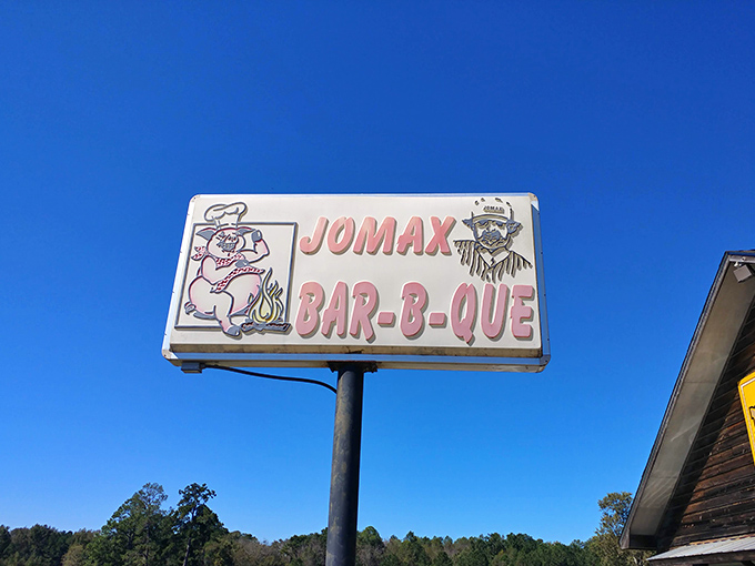 That vintage sign with its cartoon pig chef is like a beacon of hope in a world of identical restaurant chains. Authenticity never goes out of style.