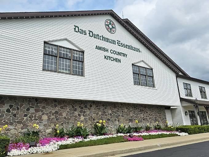 The exterior's stone foundation and meticulous landscaping hint at the attention to detail you'll find on your plate. Even the flowers look delicious.