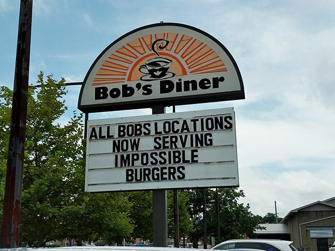 The sign doesn't just advertise&mdash;it proclaims. "Impossible Burgers" at Bob's could refer to either the plant-based option or the sheer challenge of finishing one.