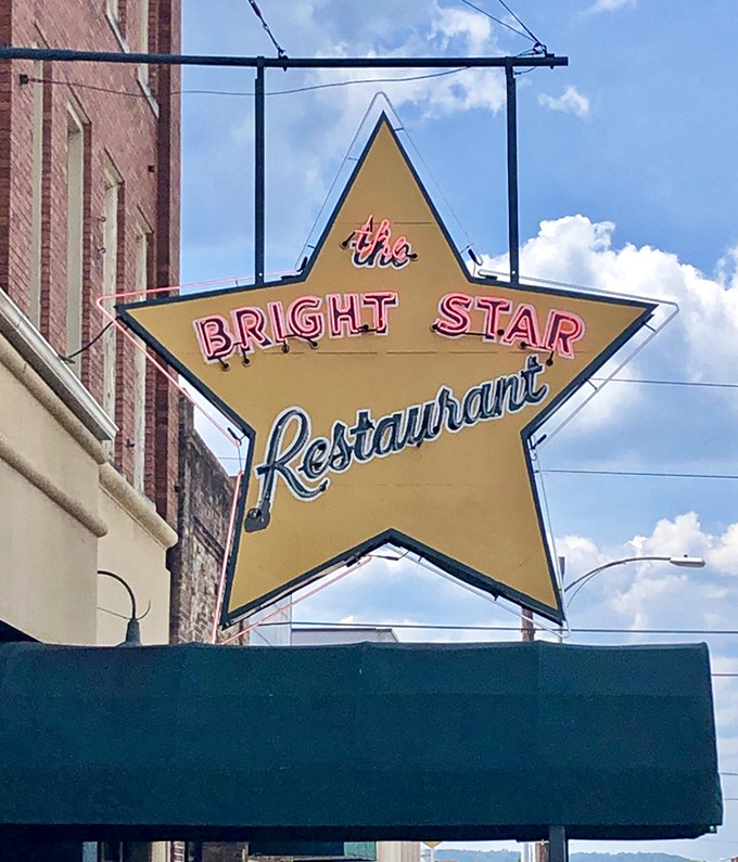 Not just a sign, but a beacon of culinary excellence that's guided hungry Alabamians through good times and challenging decades alike.