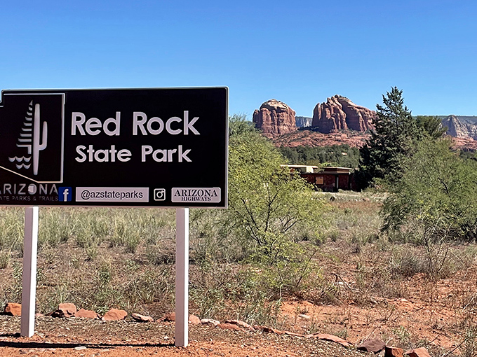 The sign that marks the beginning of wonder. Behind it stands the reason you drove all this way&mdash;and it was absolutely worth it.