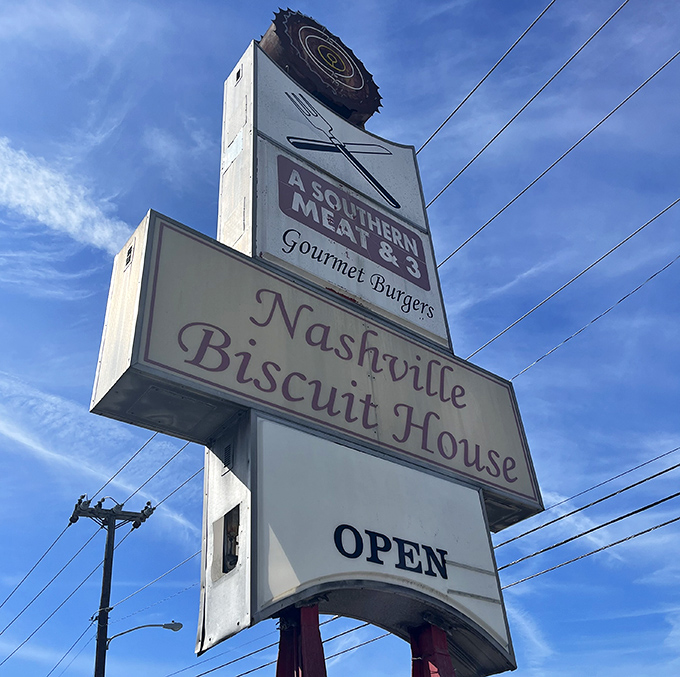 Not all heroes wear capes&mdash;some hang from poles announcing "OPEN" to hungry travelers seeking Southern comfort on a plate.