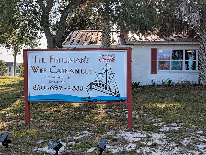 The sign promises local seafood in a setting where palm trees sway&mdash;a combination that's essentially Florida in restaurant form.