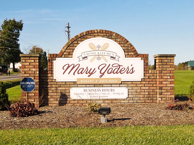 The sign announces business hours and promises&mdash;this is where locals and travelers alike come to eat very, very well.