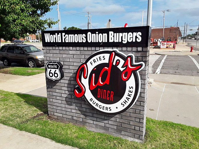 The sign says "World Famous Onion Burgers" &ndash; and after one bite, you'll wonder why they're being so modest about it.