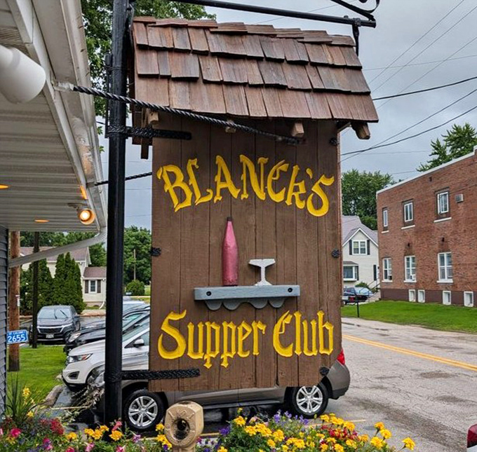 That wooden sign says everything you need to know&mdash;you've arrived at a genuine Wisconsin institution where supper isn't just a meal, it's an experience.