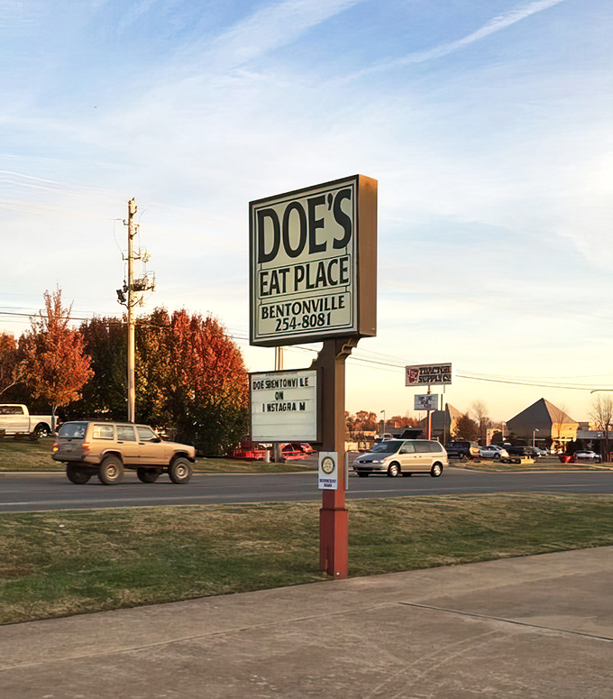 The roadside sign stands tall, a beacon for hungry travelers that simply states: "Exceptional steaks this way"—no further explanation needed.