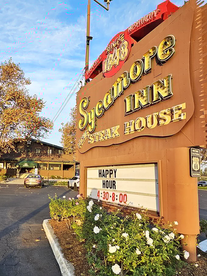 The sign promises "STEAK HOUSE" in letters large enough to be seen from space, with a happy hour that makes rush hour worthwhile.