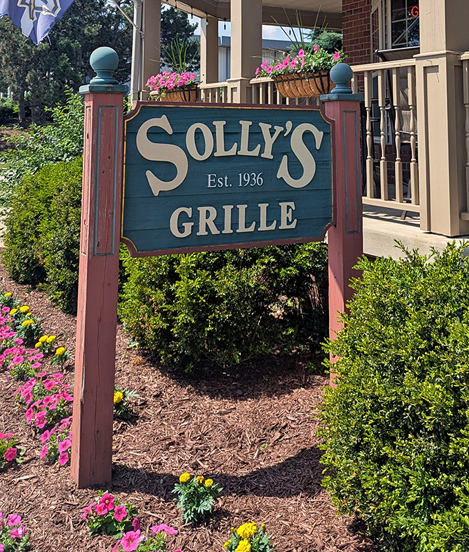 Since 1936, this sign has been beckoning butter burger pilgrims like a blue beacon of dairy-laden hope.