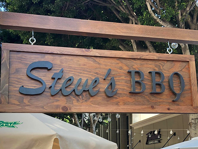 A sign that promises exactly what awaits inside &ndash; no pretense, just honest-to-goodness barbecue that makes Whittier worth the drive from anywhere.