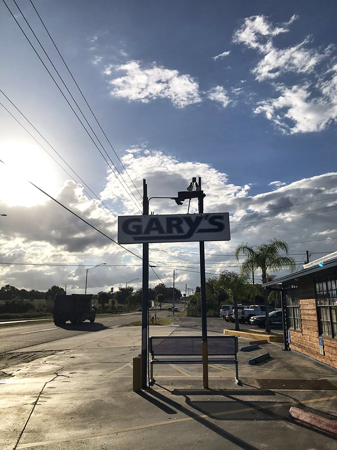 Against Florida's dramatic sky, Gary's sign stands as a beacon for seafood pilgrims&mdash;a landmark that's guided hungry travelers for generations.