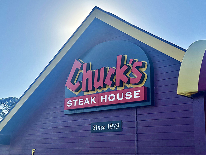 Chuck's sign standing tall and proud, like a lighthouse guiding hungry souls to steak salvation.