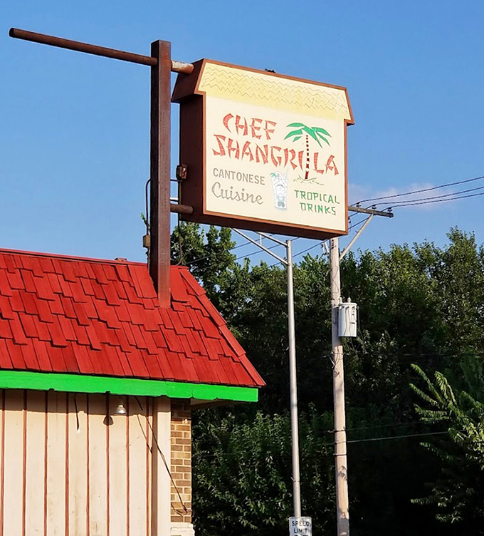 The sign stands tall against the Illinois sky, a beacon of hope for hungry travelers seeking refuge from the mundane world of chain restaurants.