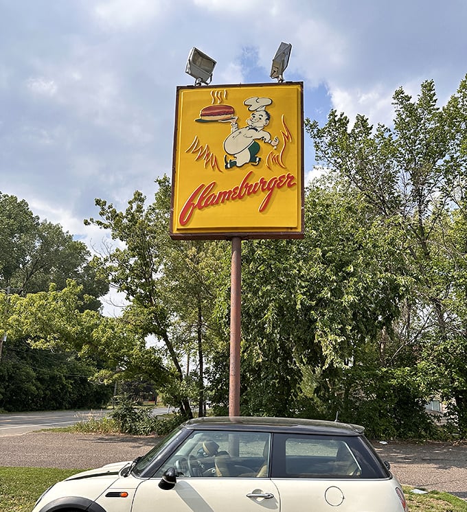 A sign that promises flame-broiled excellence and delivers on every delicious, juicy promise.