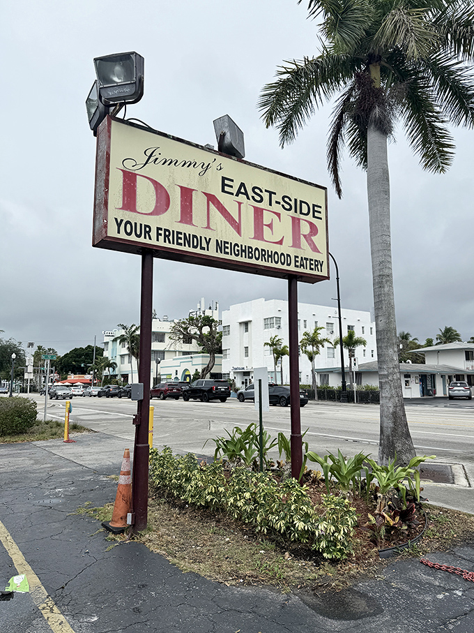 "Your Friendly Neighborhood Eatery" &ndash; the sign promises and delivers, standing tall among palm trees like Miami's answer to comfort food prayers.