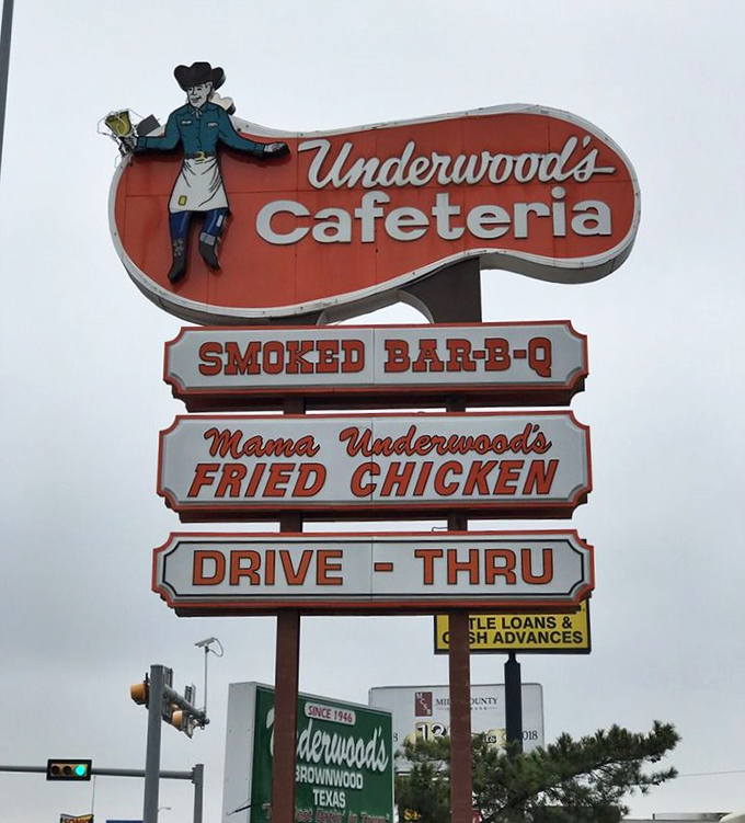 The vintage roadside sign that's guided hungry travelers for generations, promising smoked treasures and fried delights within.