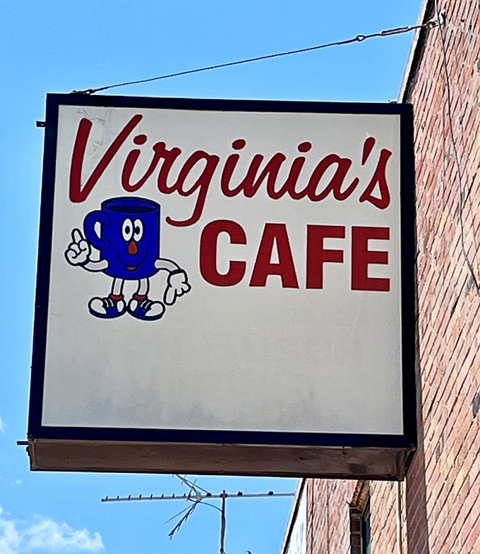 That cheerful coffee cup mascot has witnessed more morning conversations than any therapist in town. The unofficial mayor of breakfast.