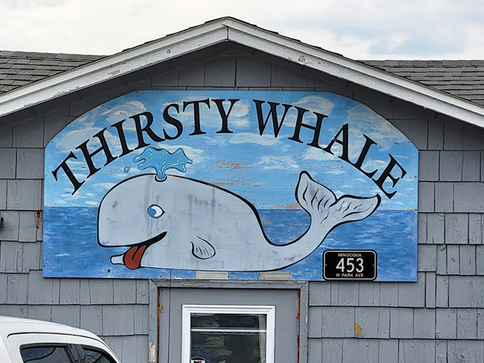 The cheerful whale sign has become an iconic Minocqua landmark, guiding hungry travelers like a blue-hued lighthouse of flavor.