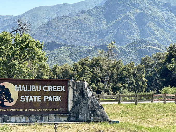 The entrance sign welcomes visitors to eight thousand acres where Hollywood history and natural beauty share equal billing on the marquee.