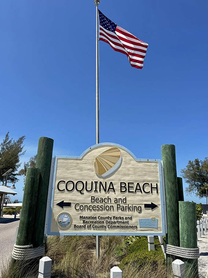 The gateway to sandy bliss. This sign doesn't just mark an entrance&mdash;it's the official boundary between your regular life and your vacation self.