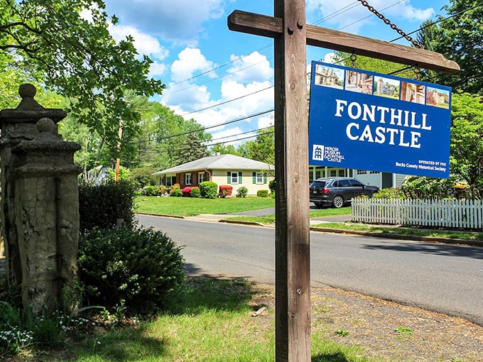 The humble sign belies the wonderland that awaits beyond. Like finding Narnia's entrance in an ordinary wardrobe, but with better tour guides.