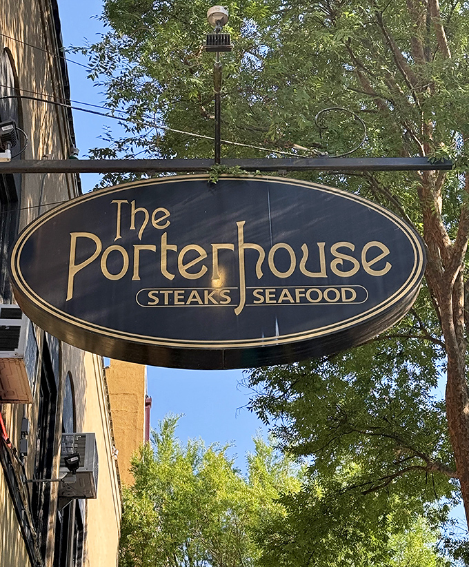 The sign promises exactly what awaits inside: steaks and seafood prepared with the kind of care that turns first-timers into regulars.