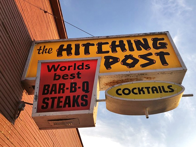 The vintage sign boldly proclaims "World's Best Bar-B-Q Steaks," a claim that generations of satisfied diners have found little reason to dispute.