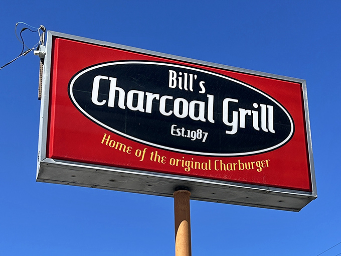 The roadside sign stands proud against the Kansas sky, a landmark for locals and a discovery for lucky travelers passing through.