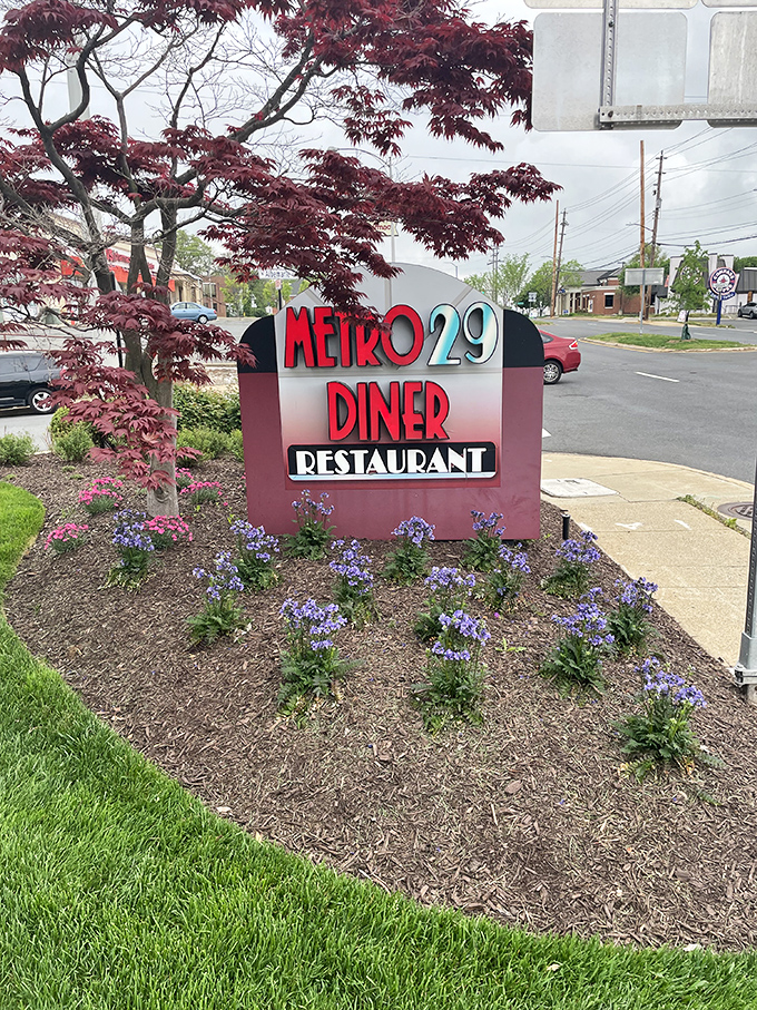 The roadside sign stands as a beacon of hope for hungry travelers—like a lighthouse, but guiding you to pancakes instead of safe harbor.
