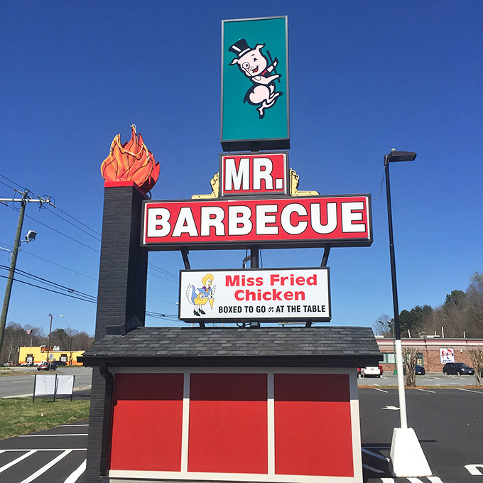 That dancing pig in a chef's hat isn't just a sign; it's a sixty-year promise that what awaits inside transcends mere food to become edible heritage.