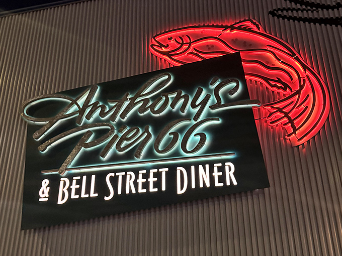 This glowing neon salmon sign acts like a beacon, guiding hungry souls to seafood salvation nightly.