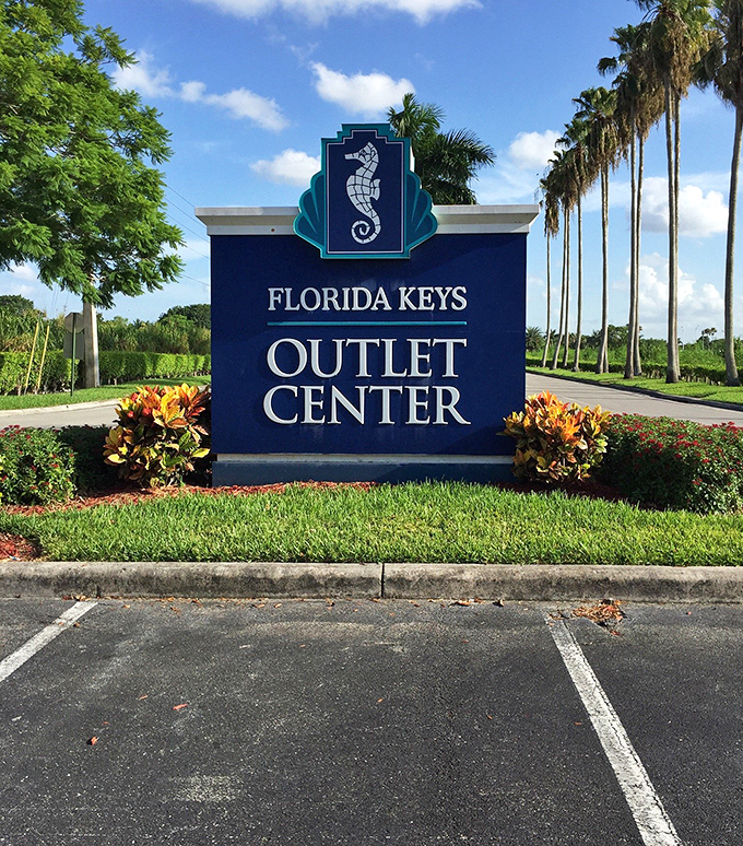 The seahorse welcomes you to shopping paradise&mdash;a maritime mascot promising ocean-deep discounts just before the actual ocean begins.