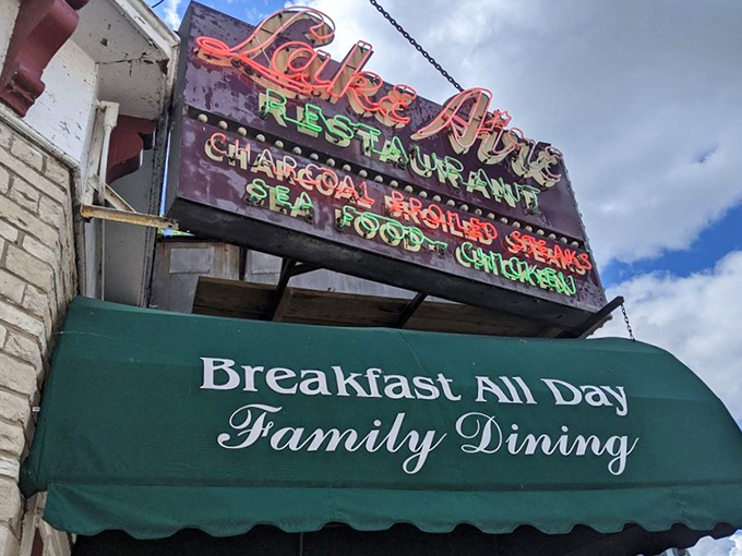 That vintage sign has been guiding hungry travelers to "Breakfast All Day" longer than most food trends have lasted. Some promises never go out of style.