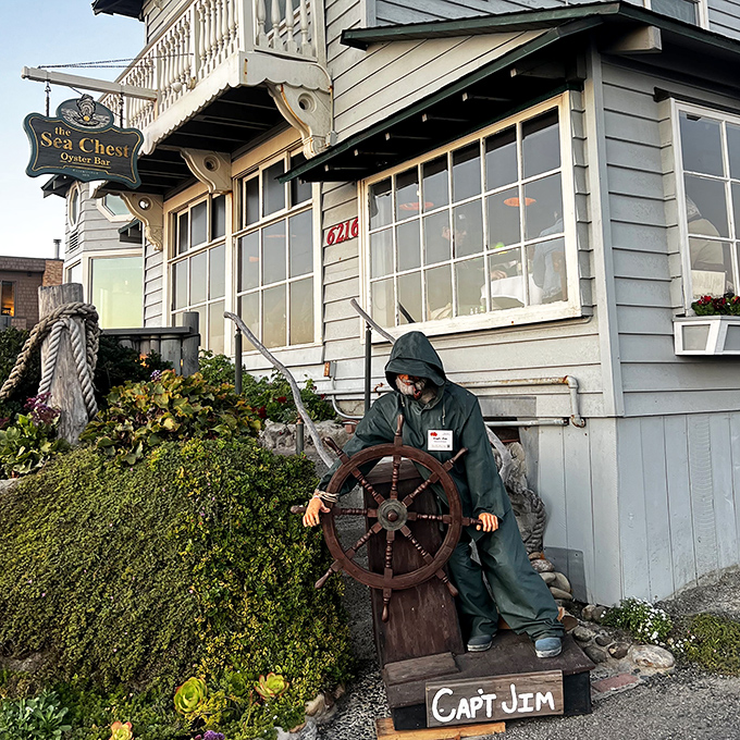 Captain Jim stands eternal watch outside the restaurant, a whimsical maritime guardian welcoming seafood pilgrims to this coastal shrine.