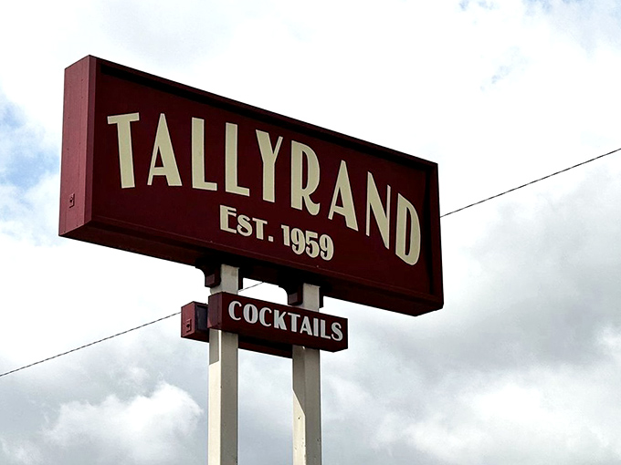 The vintage sign stands as a beacon for hungry travelers, promising cocktails and comfort in equal measure since 1959.