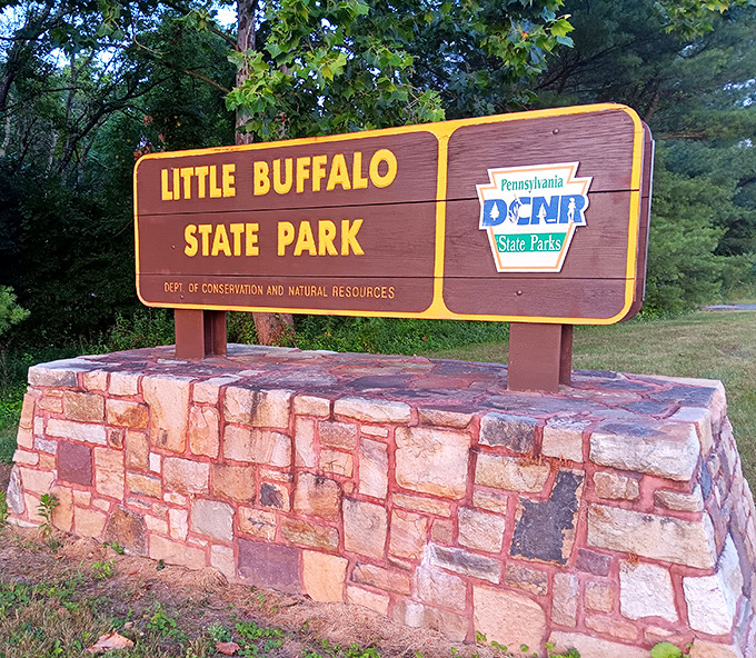 Welcome to Little Buffalo State Park, where even the entrance sign sits pretty on its stone throne.