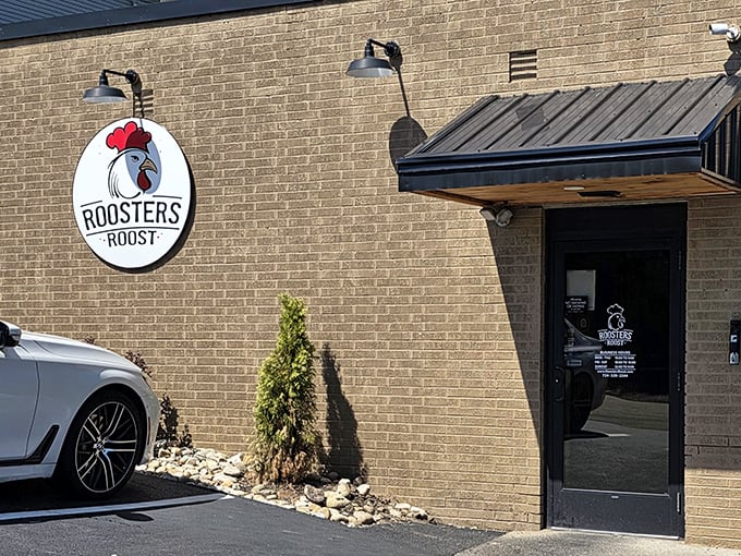 Another view of the welcoming entrance, complete with the watchful rooster logo. Like a culinary lighthouse guiding hungry souls to sandwich salvation in Uniontown.
