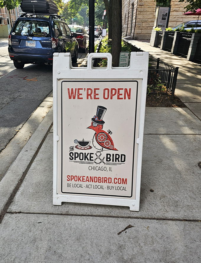 Their sidewalk sign doesn't just say "We're Open"&mdash;it announces "We're here, we're local, and we've got a bird wearing a top hat" with unmistakable Chicago pride.
