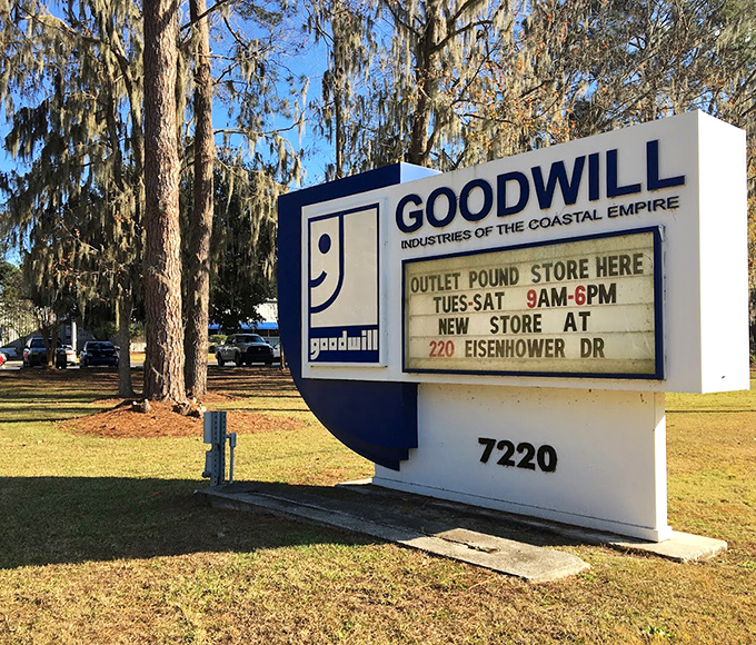 The sign stands sentinel among Spanish moss, a blue beacon for bargain hunters throughout the Coastal Empire.