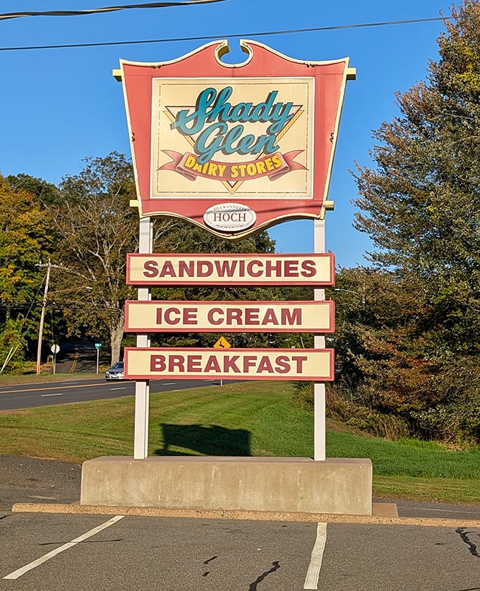 The vintage roadside sign stands tall against Connecticut blue skies. Three simple words&mdash;Sandwiches, Ice Cream, Breakfast&mdash;tell you everything you need to know.